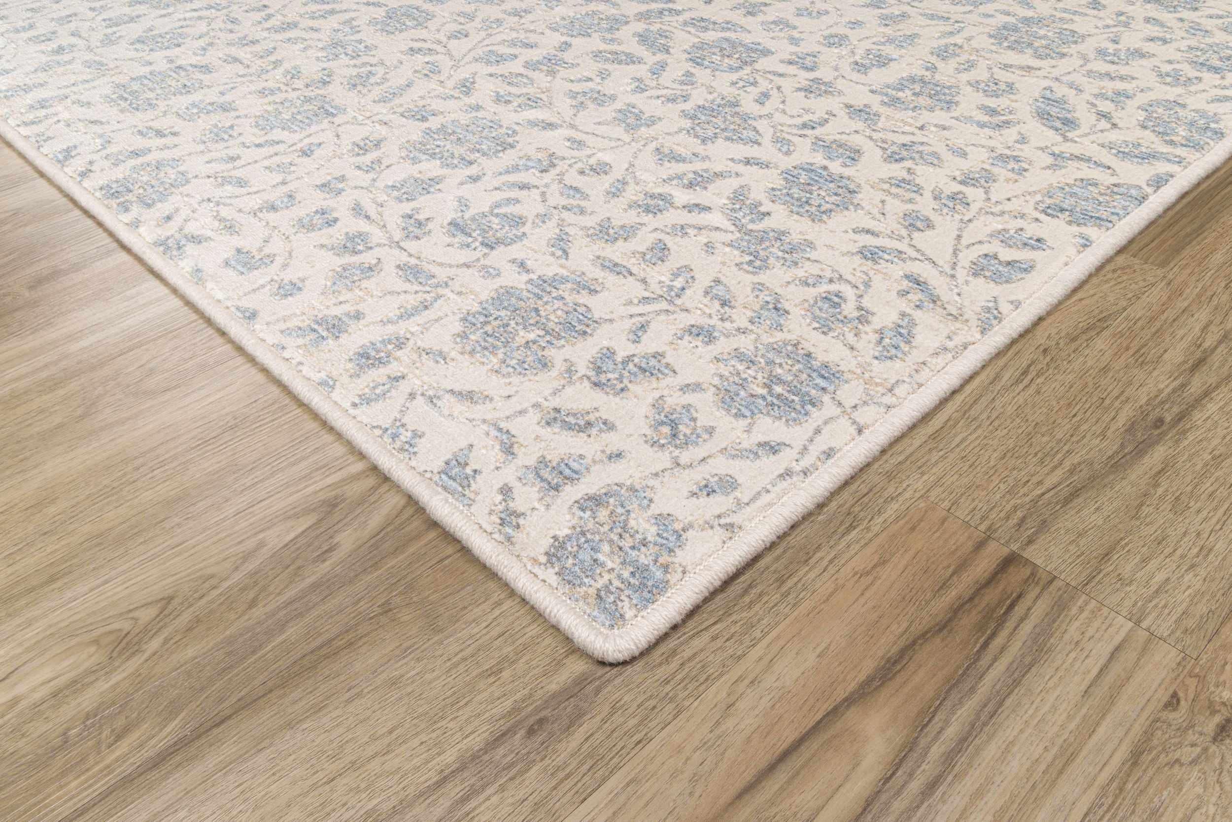 Gita 100% Polyester Carpet with Floral Design